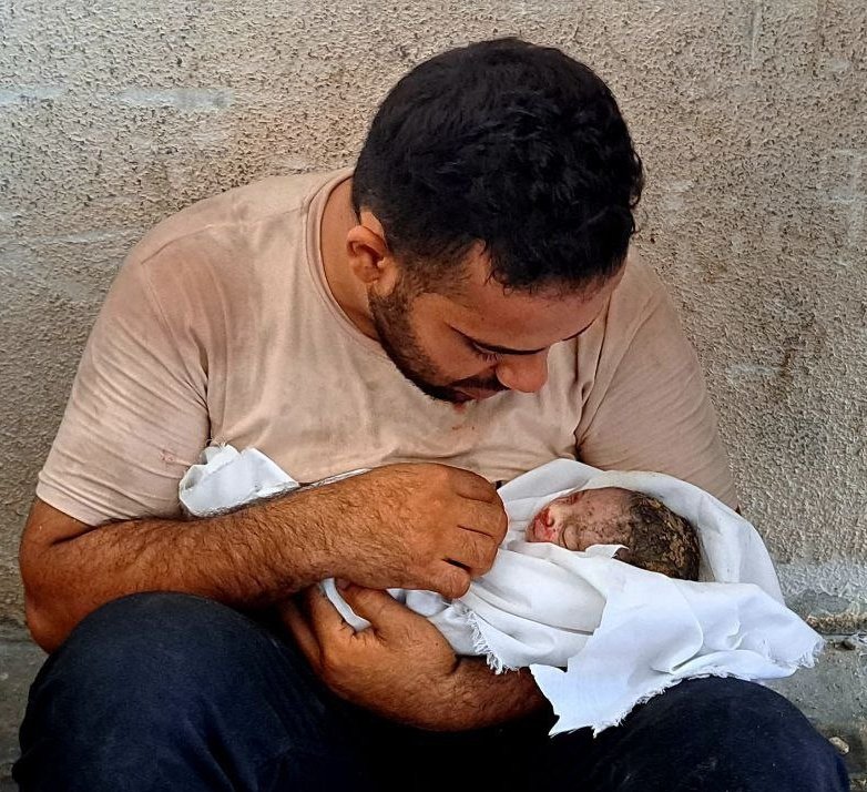 Video: Bereaved Palestinian father speaks to lifeless body of his baby ...